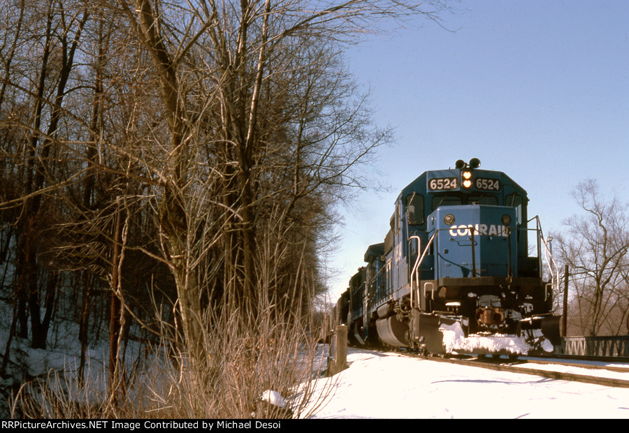 CR SD-40-2 #6524 leads a train in the snow